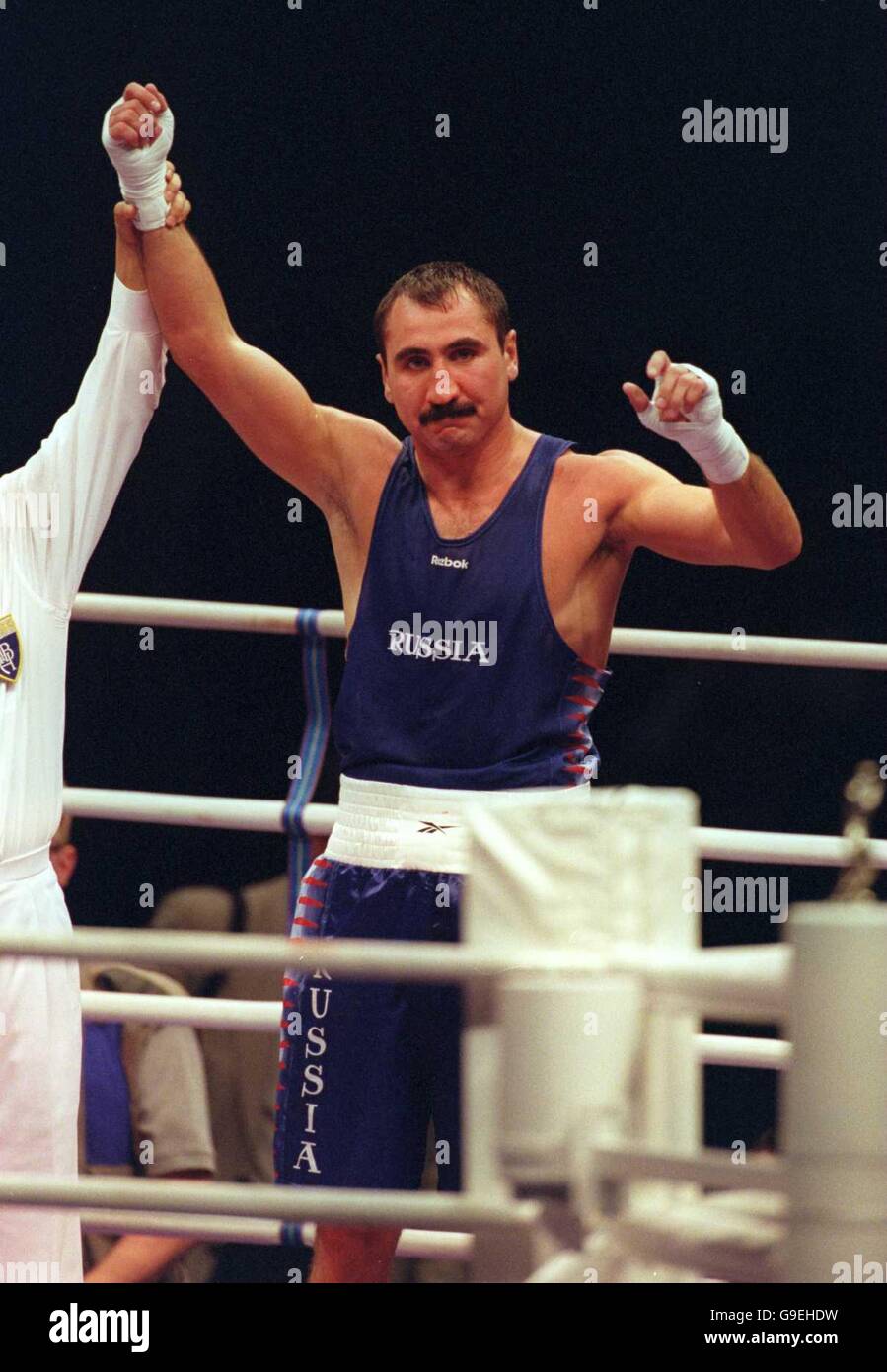 Sydney 2000 Olympic Games - Boxing - 81kg Final. The referee raises the ...