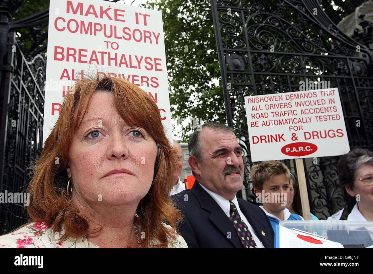 Protestors gather outside the Dail, Dublin, as Susan Grey (left ...