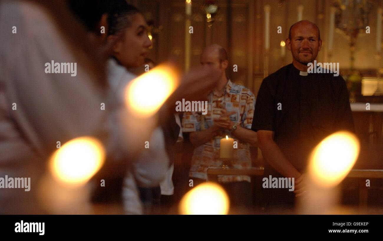 Vicar on church roof Stock Photo - Alamy