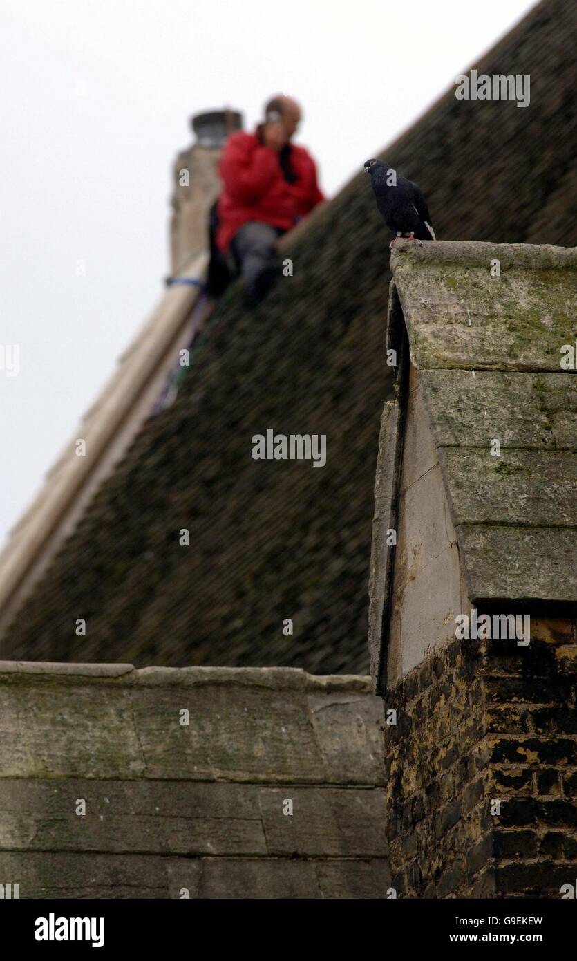 The Rev Malcolm Hunter on the roof of his St Michael's Church in Camden ...