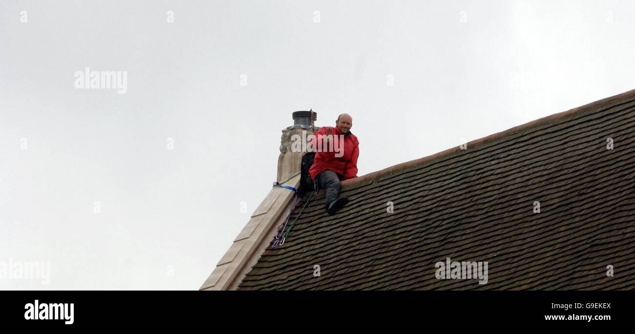 The Rev Malcolm Hunter on the roof of his St Michael's Church in Camden ...