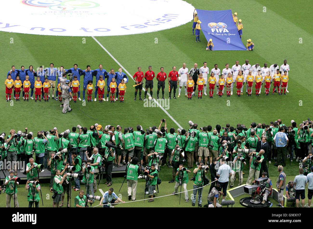 The two teams line up in front of the press before the match Stock ...