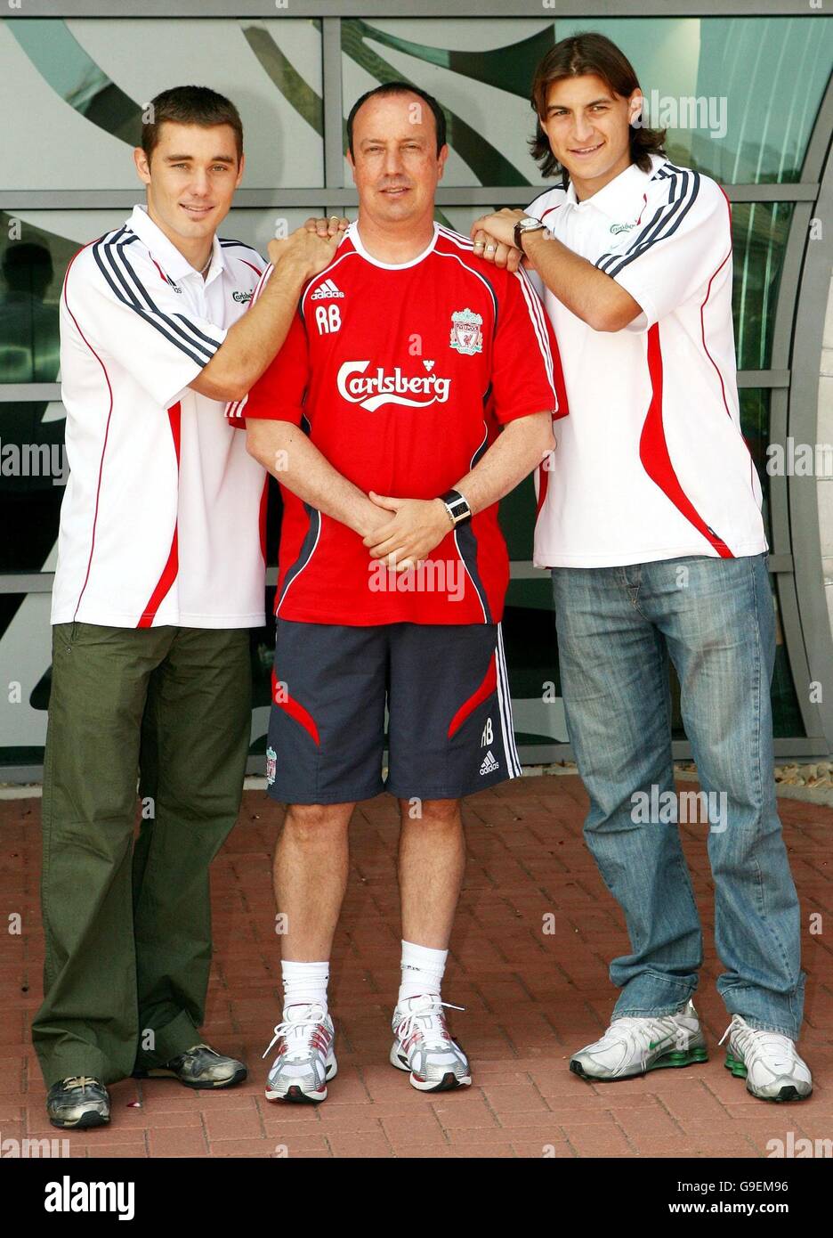 Liverpool manager Rafael Benitez (centre) with his new signings Fabio ...