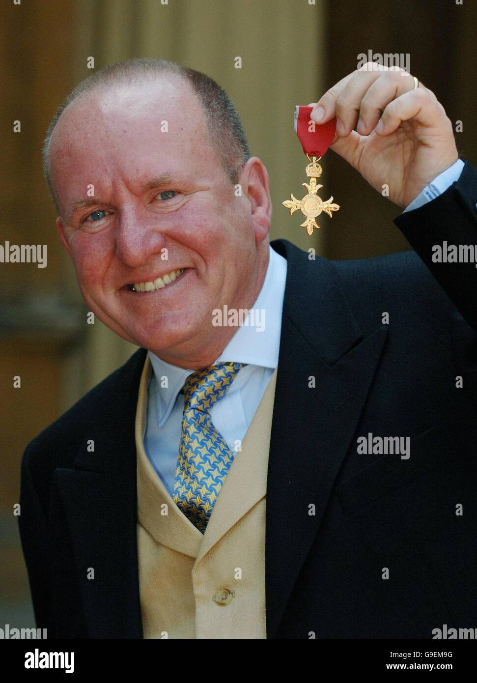 Video game developer ian livingstone at buckingham palace hi-res stock ...