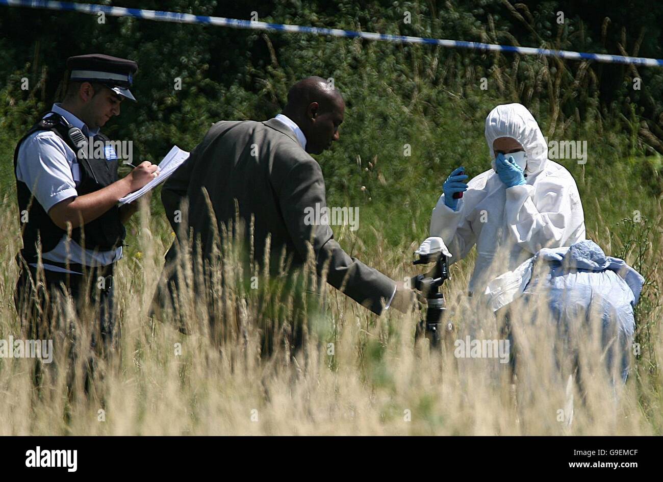 Police forensic officers examine the scene at waltham forest hi-res ...