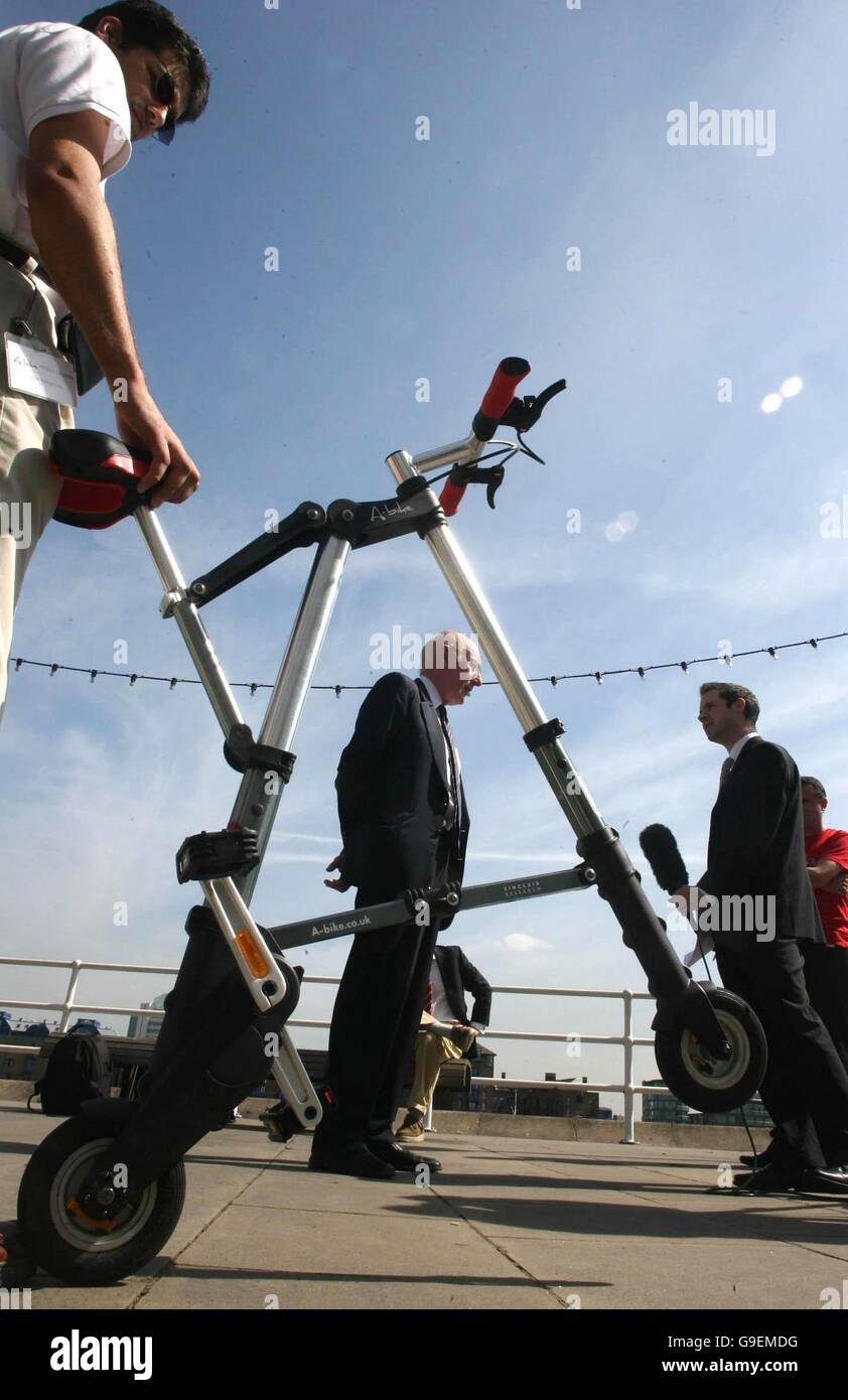 Sir Clive Sinclair chats to the media whilst Alex Kalogroulis (left ...