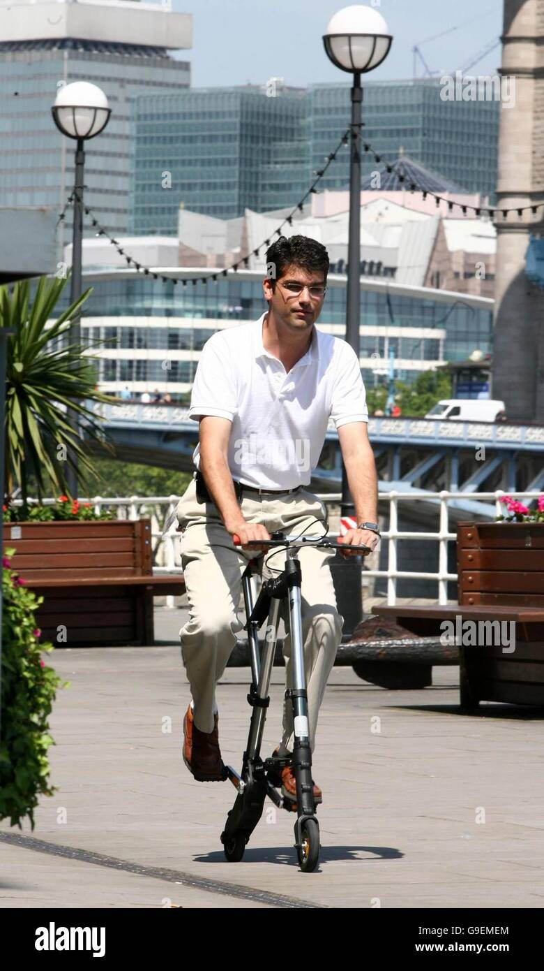 Alex Kalogroulis, coinventor with Sir Clive Sinclair, shows off their ...