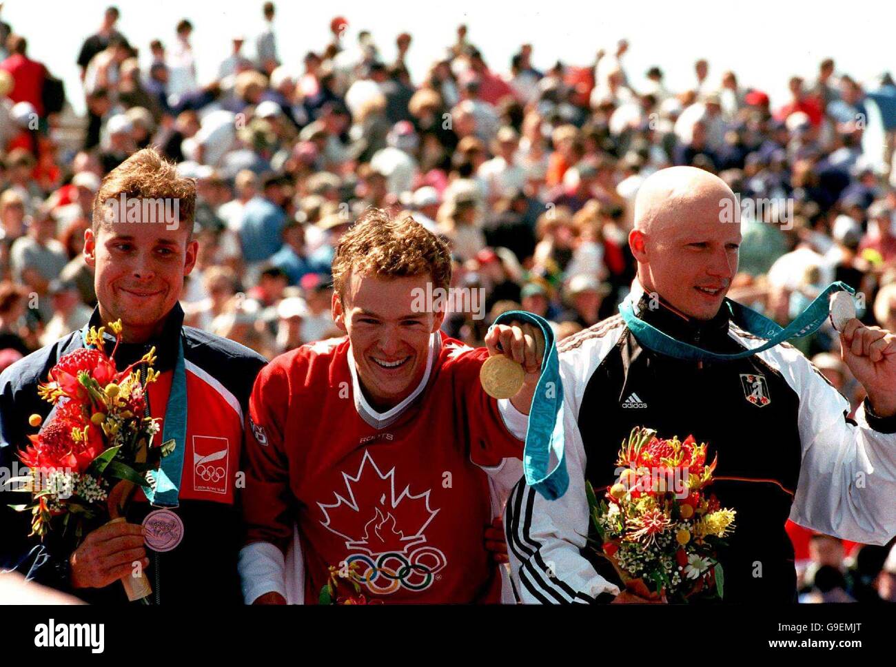 The triathlon medal winners l r czech republics jan rehula hi-res stock ...