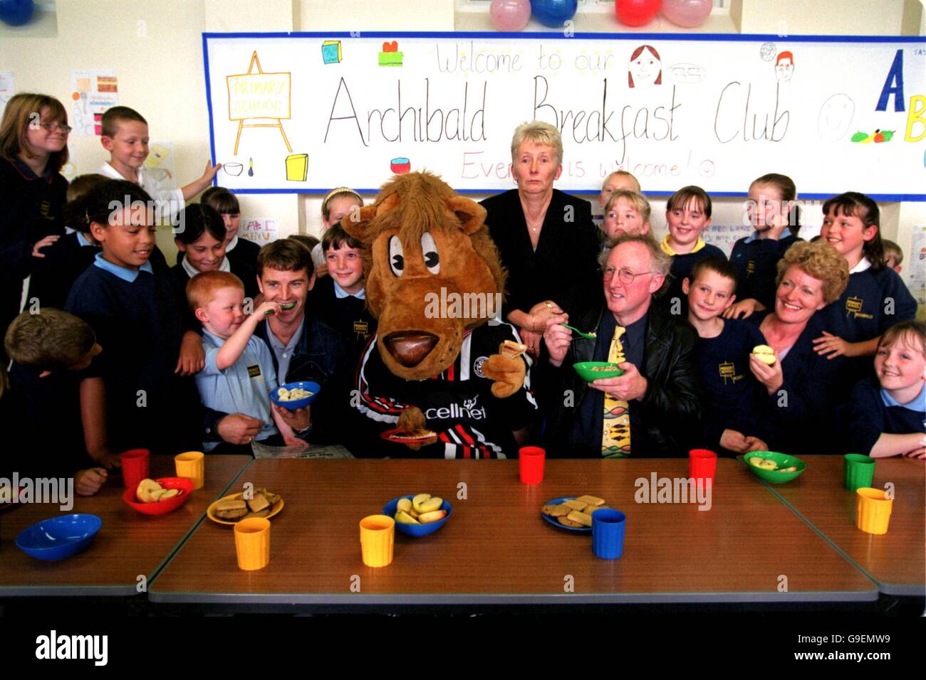 Middlesbrough mascot Roary The Lion (c) and defender Colin Cooper (l ...