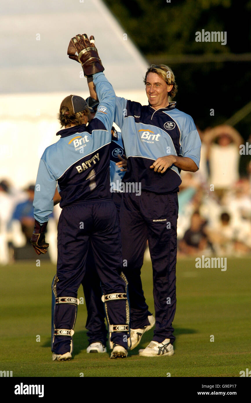 Surrey Brown Caps' Rikki Clarke celebrates with Jonathan Batty Stock ...