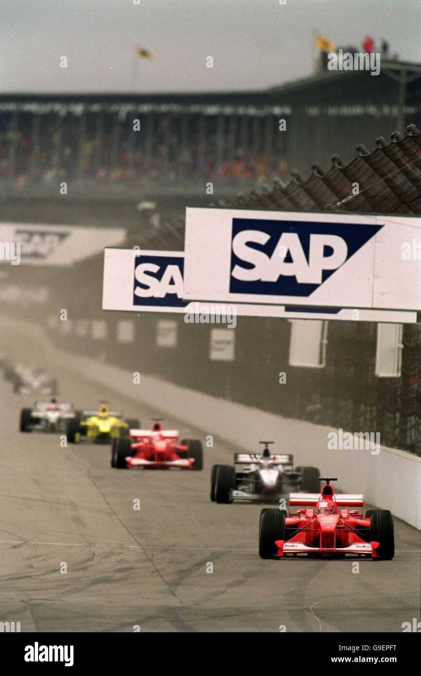 Michael schumacher leads mika hakkinen on his way to victory hi-res ...
