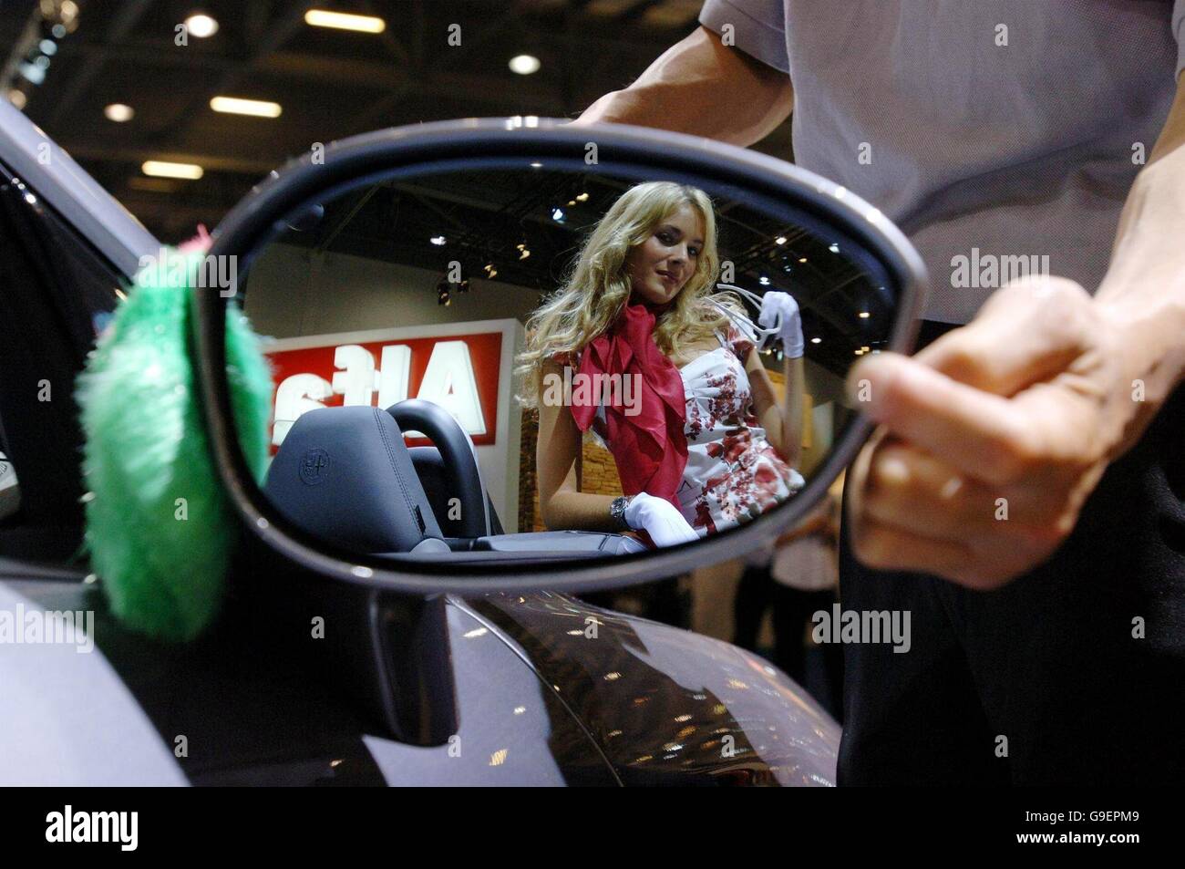 Bethany Alderson promotes the Alfa Romeo stand at the British ...