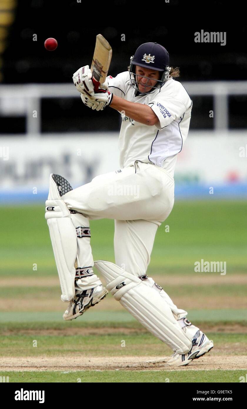 Gloucestershire's Alex Gidman is struck on the helmet from a delivery ...