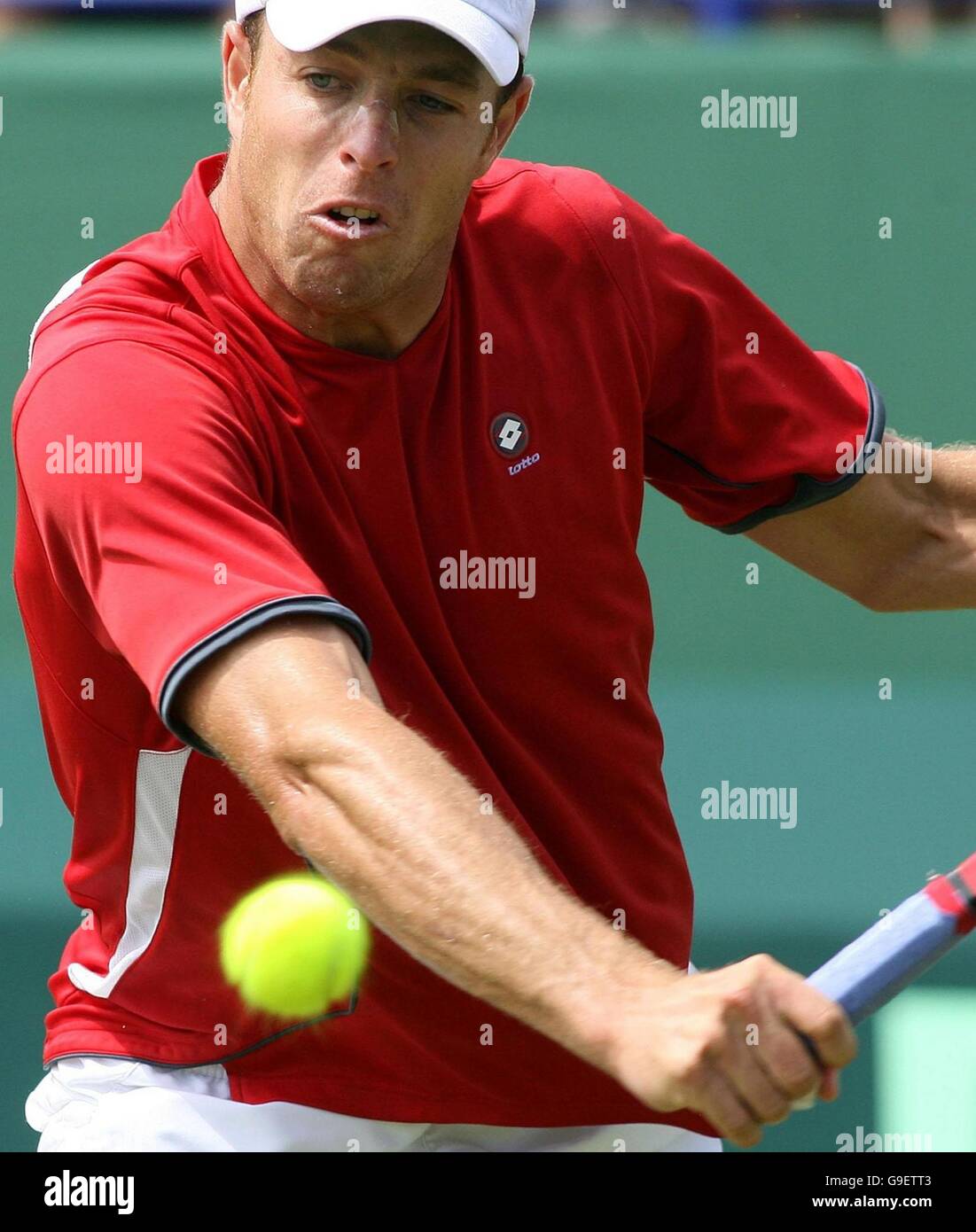 Israel's Noam Okun in action against Great Britain's Jamie Delgado ...