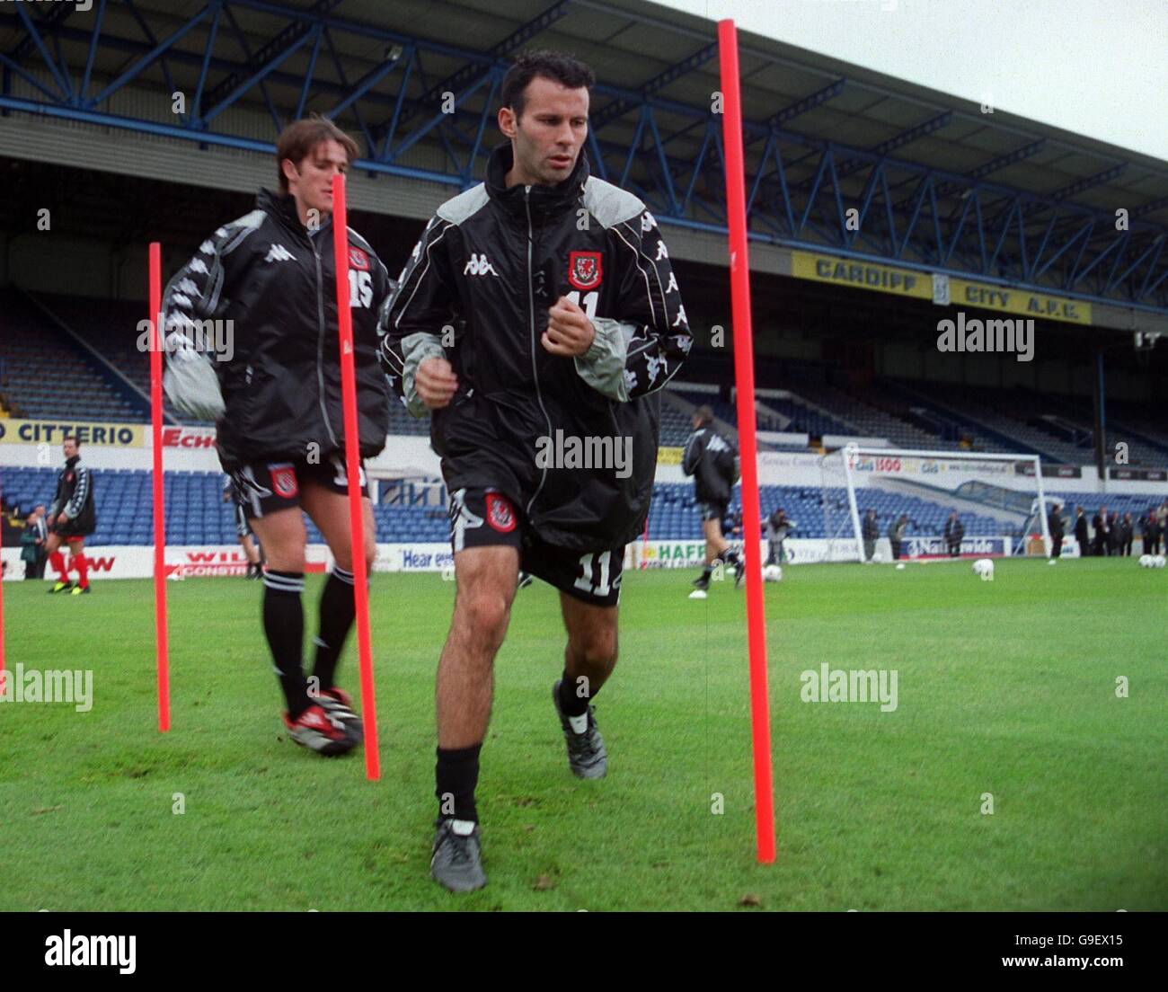 Poles weaving between dodging football hi-res stock photography and ...