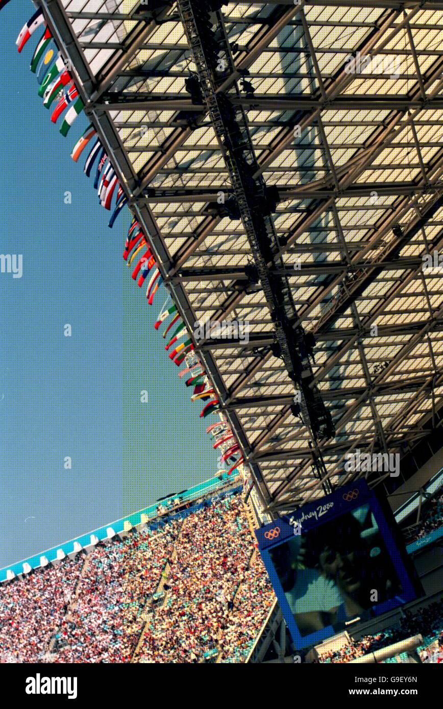 National flags flying on the roof of Stadium Australia Stock Photo - Alamy