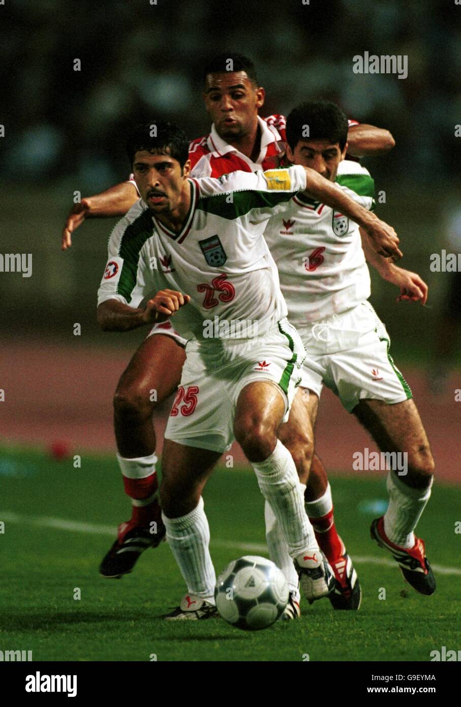 Rida Antar of Lebanon tries to stop Karim Bagheri (6) and Mehrdad ...