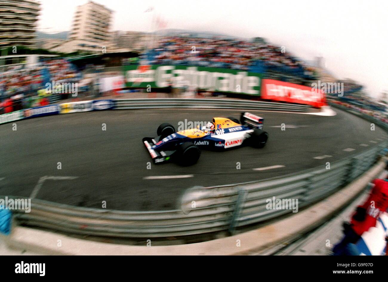 NIGEL MANSELL DRIVES ROUND SWIMMING POOL (WIDE PAN SHOT Stock Photo - Alamy