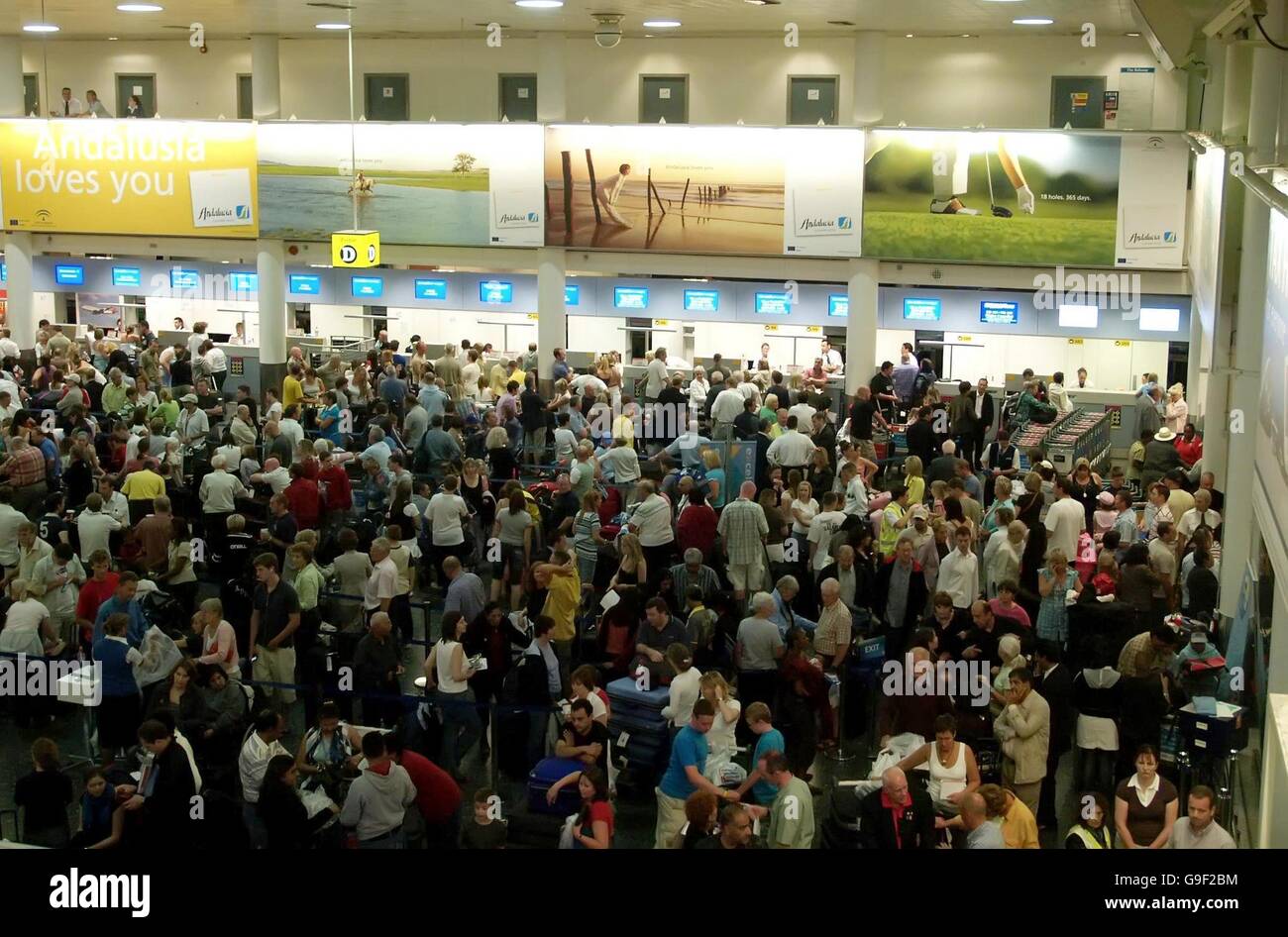 Passengers crowd the departure hall of the Gatwick South Terminal ...