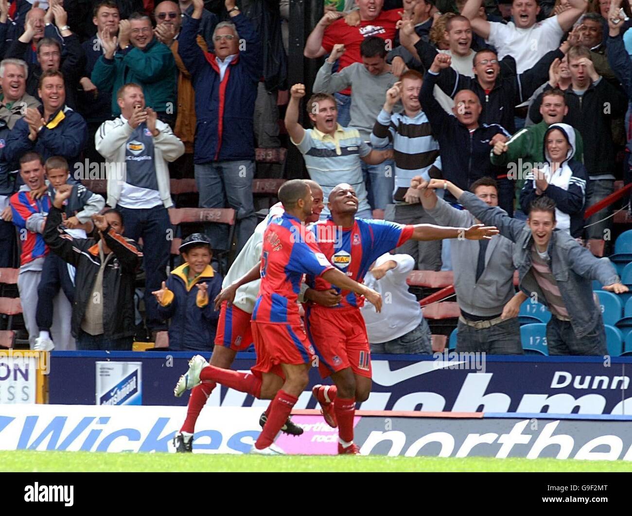 Crystal Palace's Clinton Morrison (right) celebrates scoring against ...