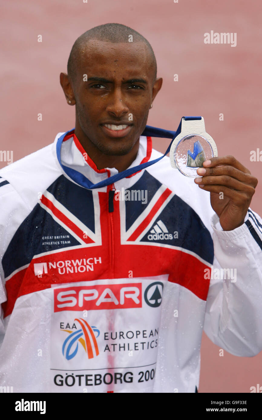 Great Britain's Nathan Douglas with his silver medal in the triple jump ...