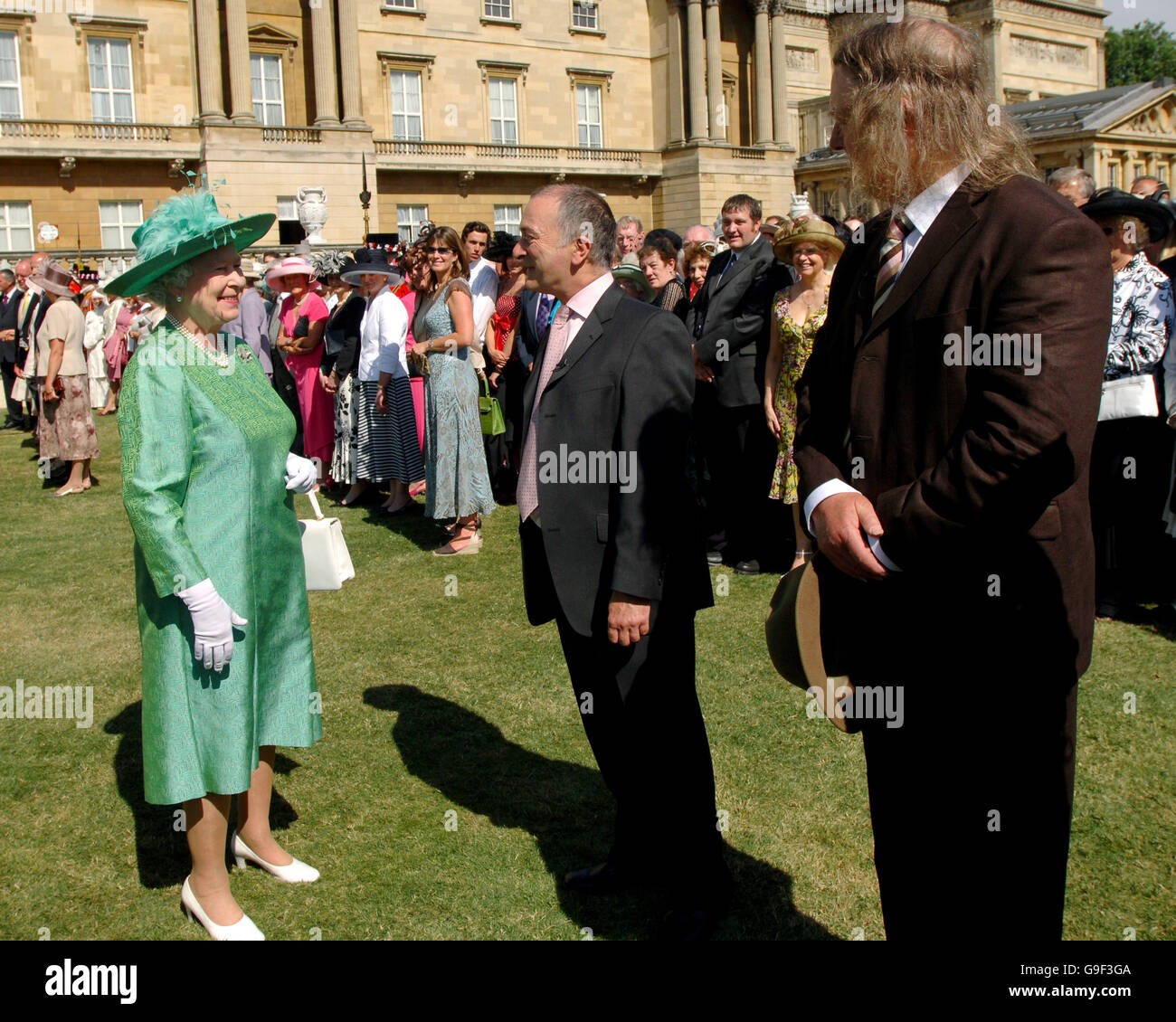 The Queen meet Tony Robinson (centre) and Phil Harding from Channel 4's ...