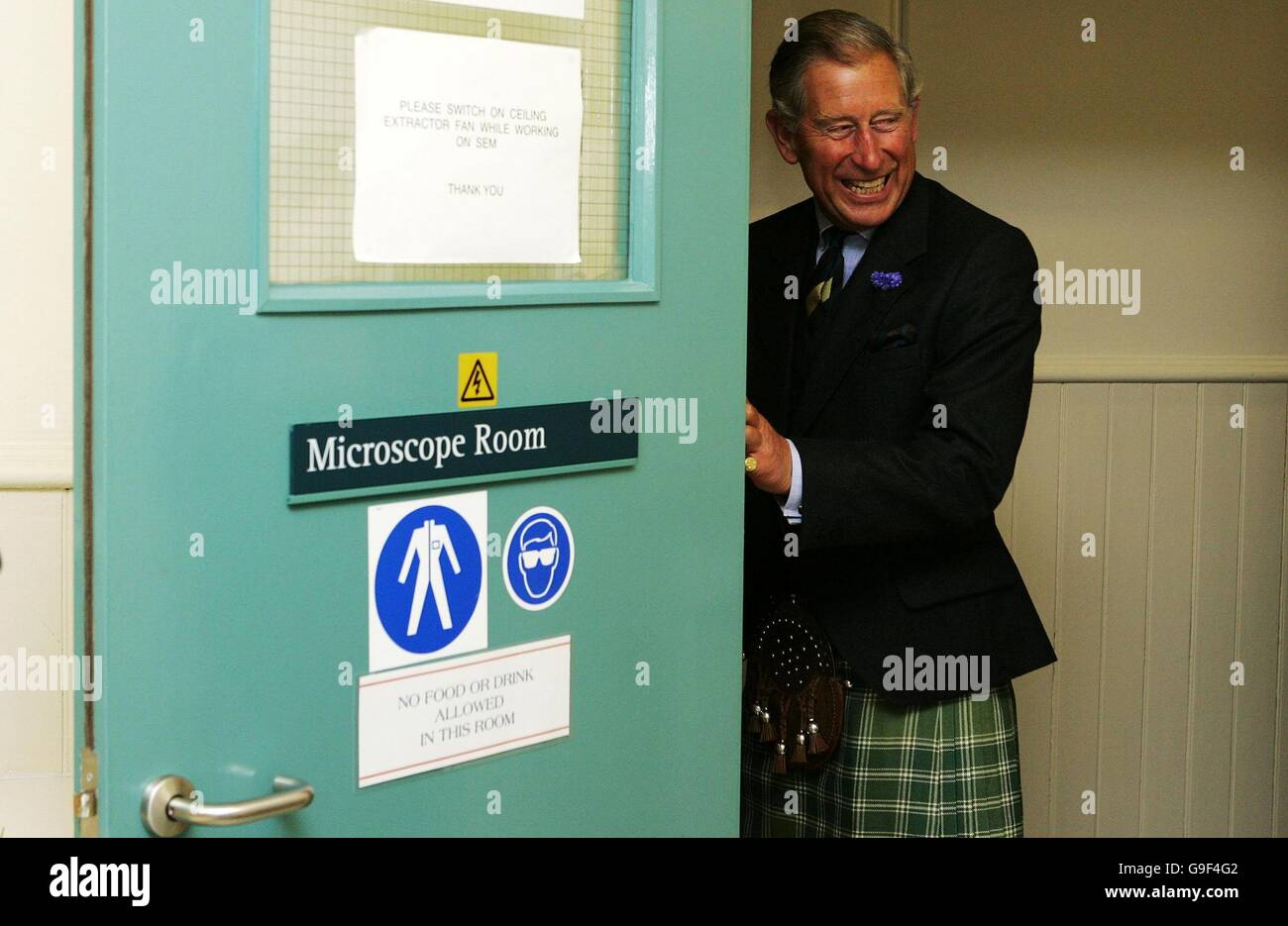 Prince Charles, Duke of Rothesay, enters the microscope room during a ...