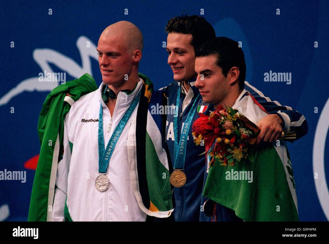 Gold medallist Domenico Fioravanti of Italy (c) poses with silver ...