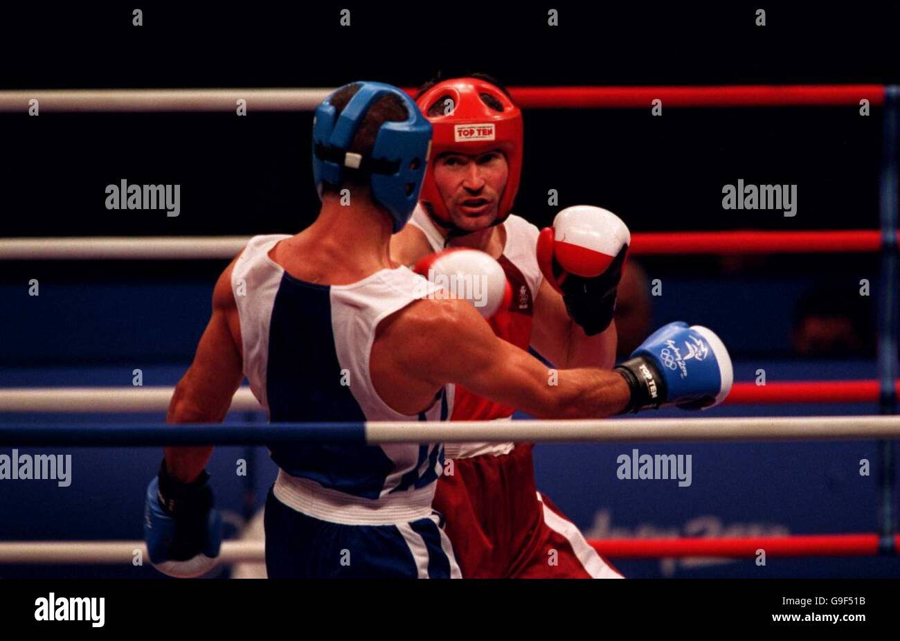 Ireland's Michael Roche (r) launches a rare attack during his loss to ...