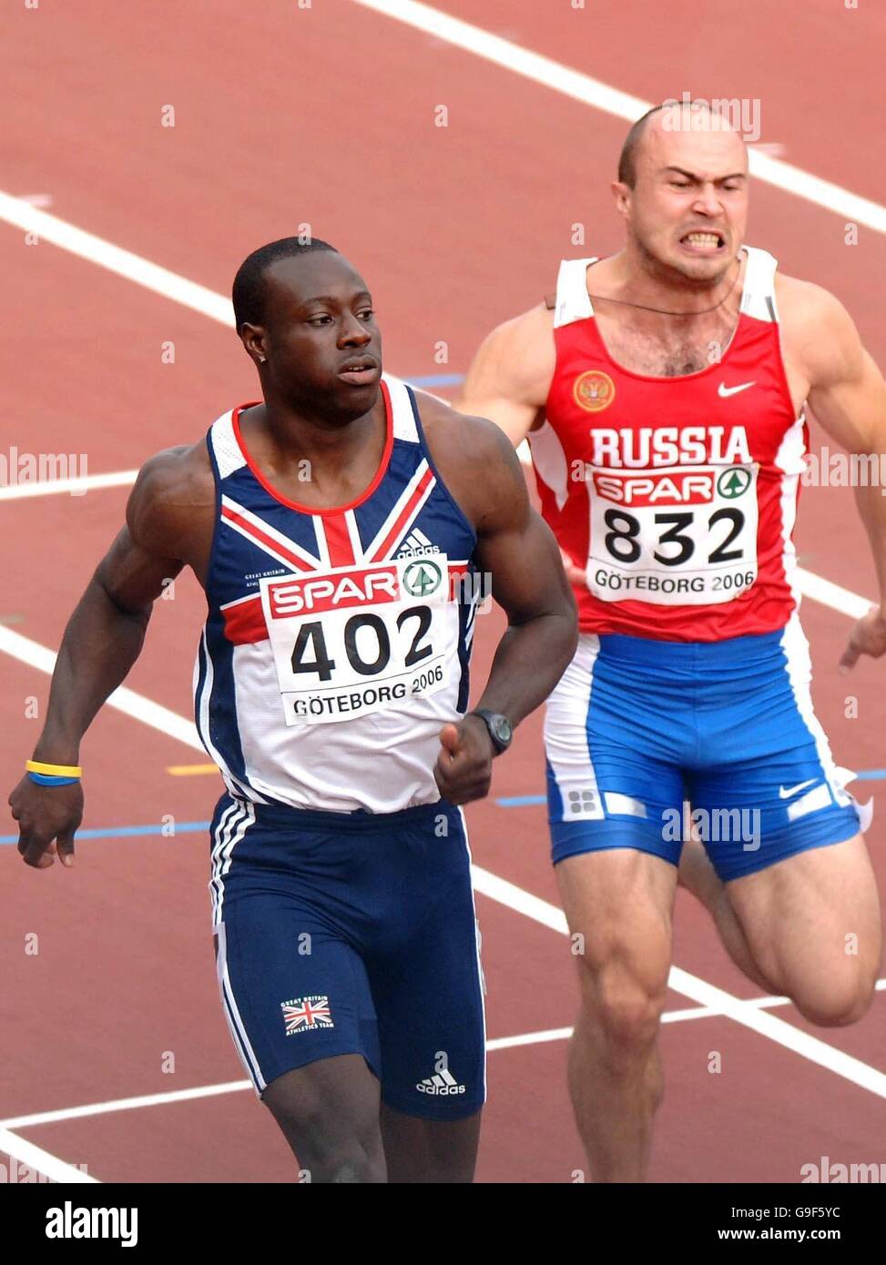 Great Britain's Tyrone Edgar (left) wins his first round 100m race ...