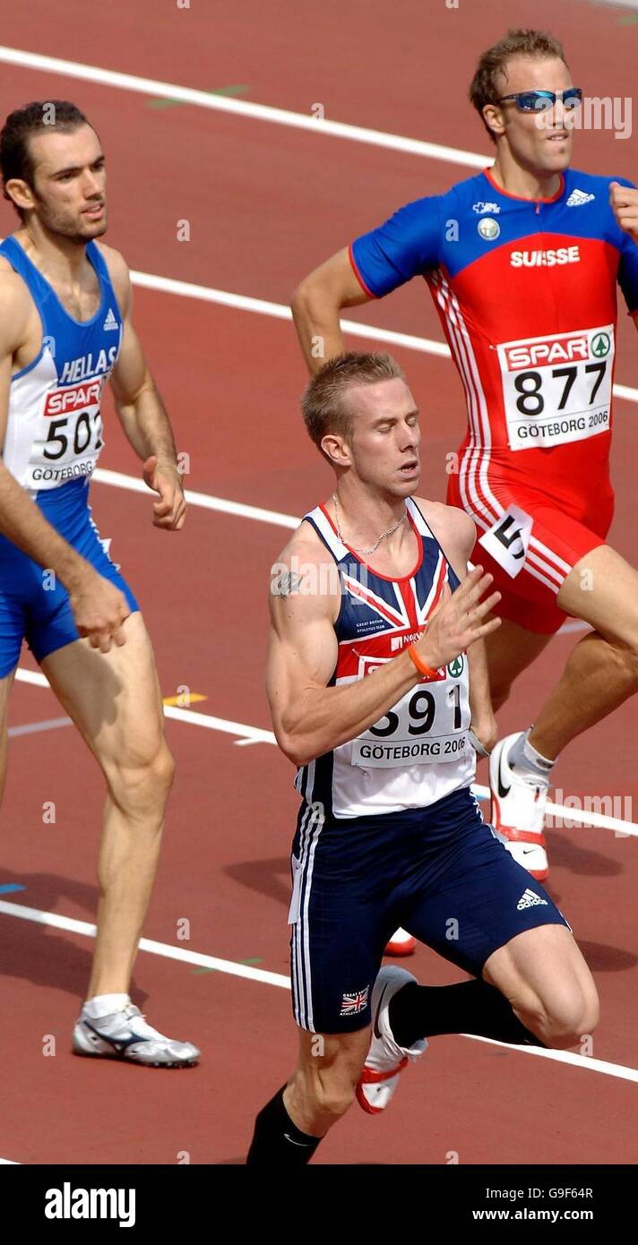 Great Britain's Tim Benjamin (centre) wins his first round race of the ...