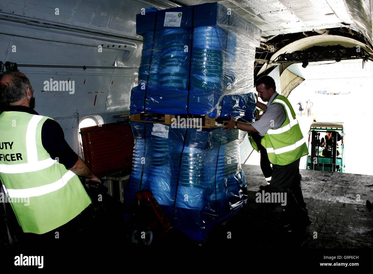 Kent International Airport staff load the oxfam freight heading for ...
