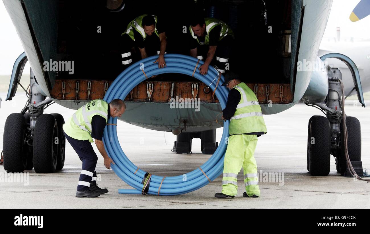 Kent International Airport staff load the oxfam freight heading for ...