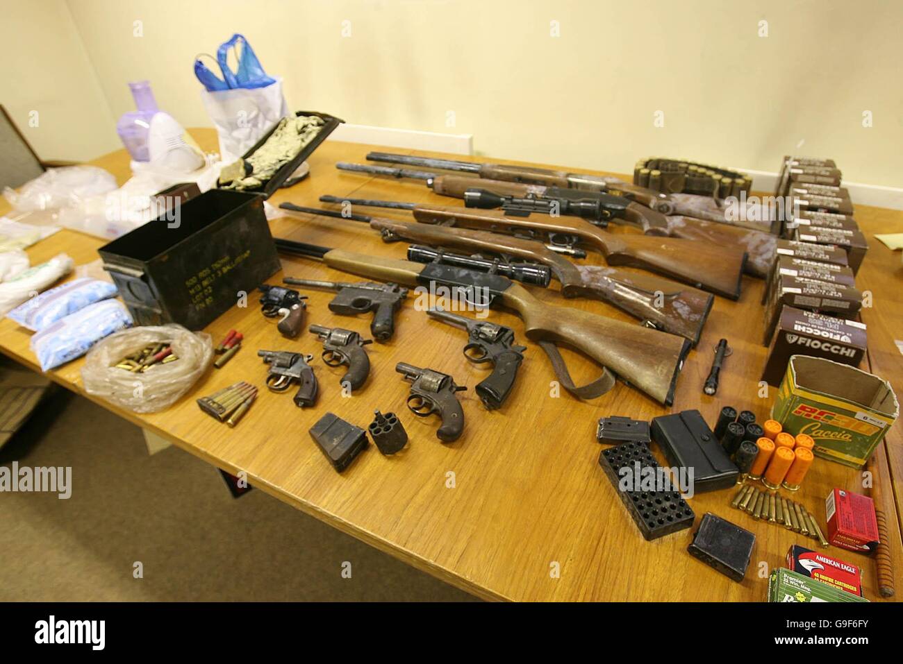 A selection of drugs and fire arms that have been siezed by police in ...