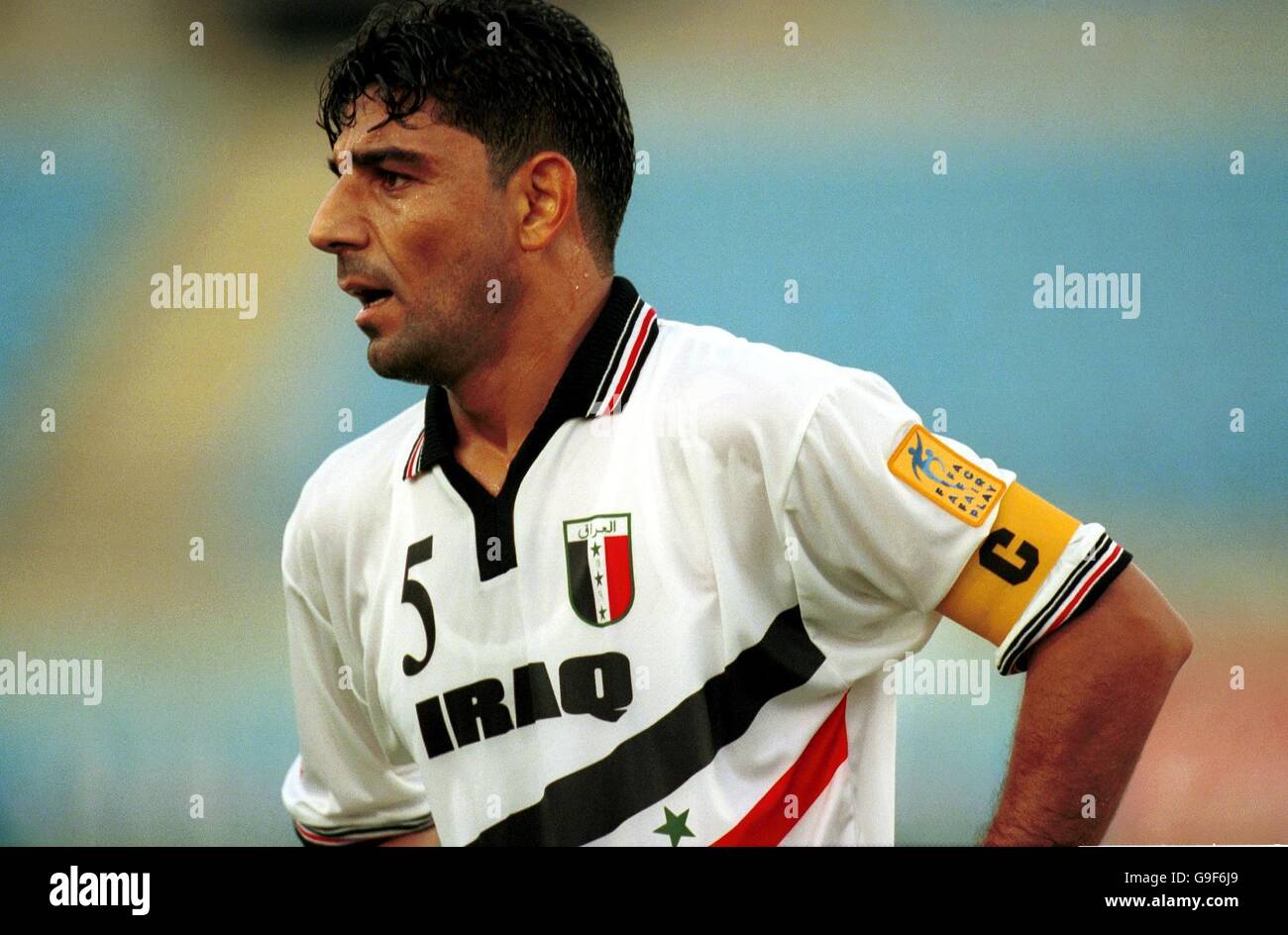 Iraq captain Hamza Hadi wearing a white kit after losing a toss to ...