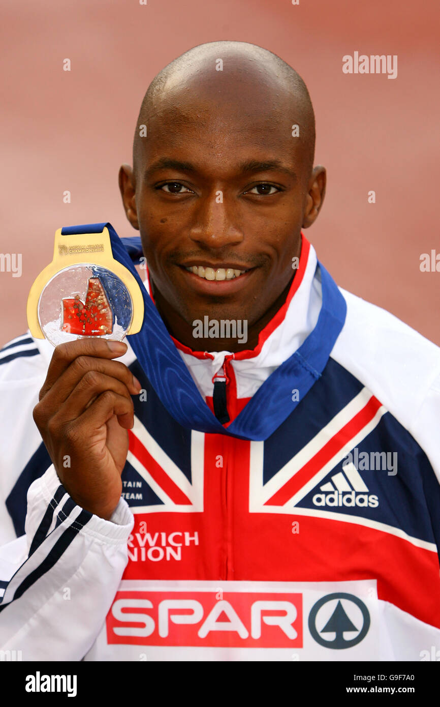 Great Britain's Marlon Devonish with his bronze medal in the 200m Stock ...