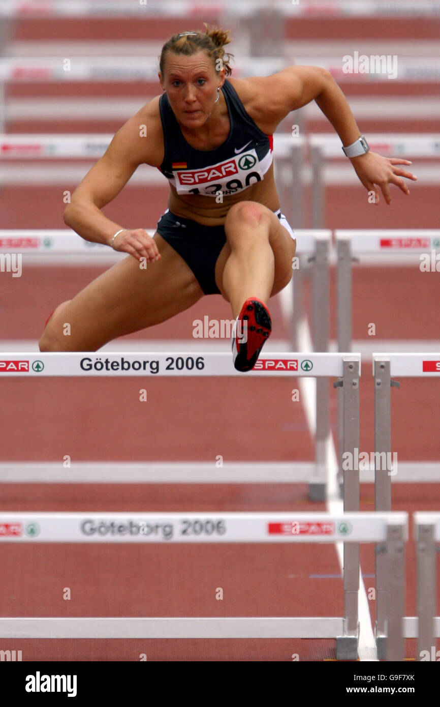 Germanys kirsten bolm competes in the 100m hurdles hi-res stock ...