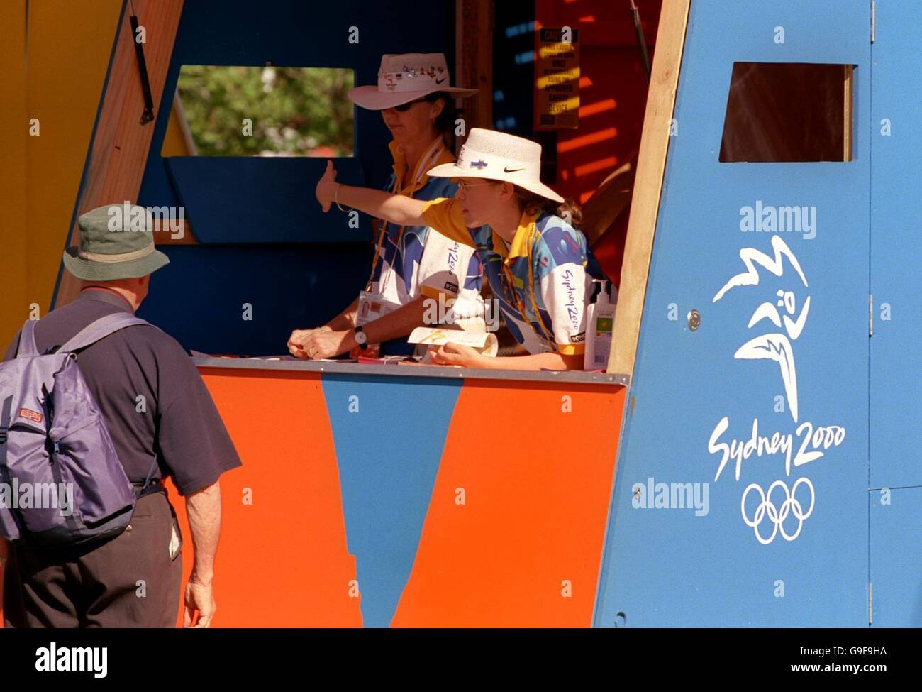 Sydney 2000 Olympic Games - Olympic Ambience. A fan is given directions ...