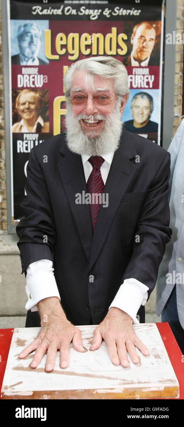 Irish folk legend Ronnie Drew making a plaster mould of his hands ...