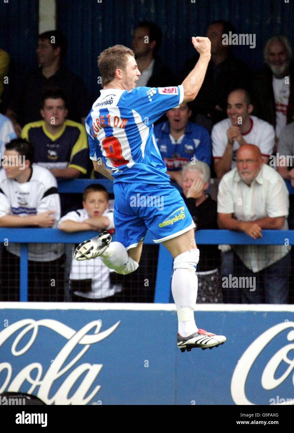 Colchester's Jamie Cureton celebrates after scoring against Derby ...
