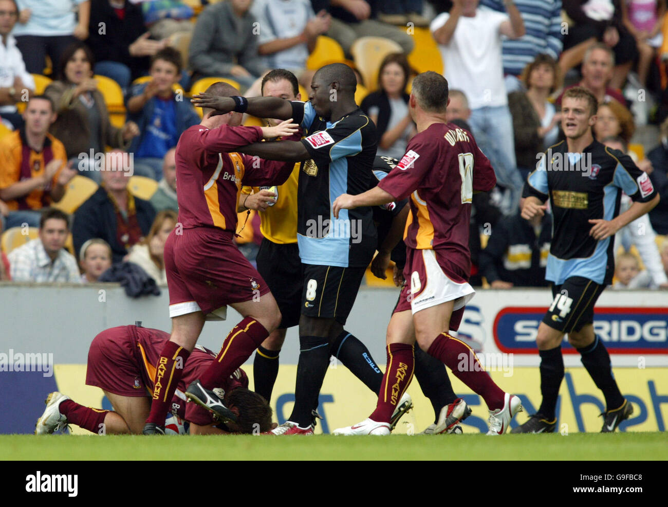 Bradford City's Alan Rogers and Rotherham United's Pablo Mills confront ...