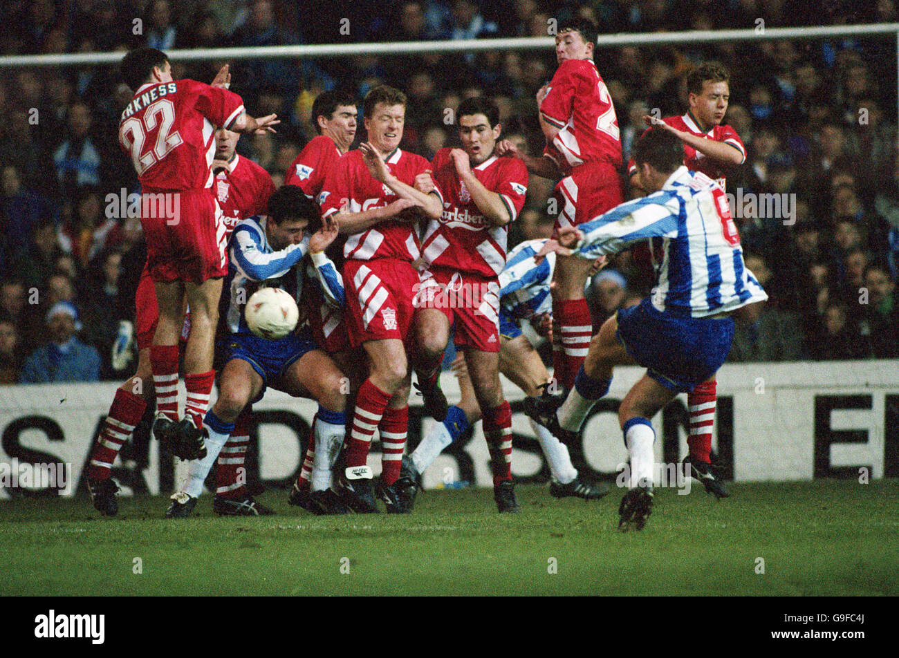 Chris Waddle of Sheffield Wednesday (right) tries to curl the ball ...