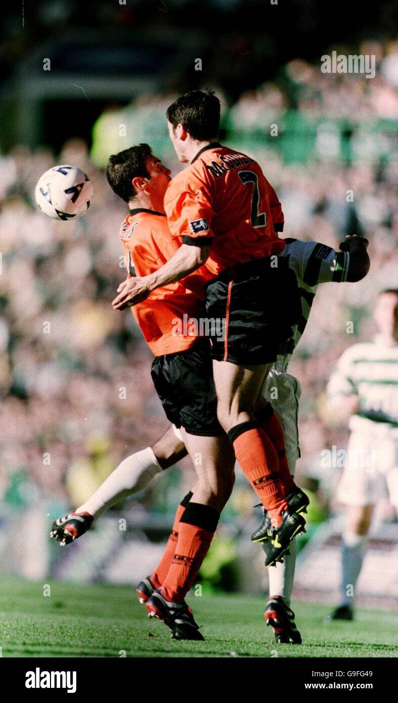Dundee United's John McQuillan (r) and Anastasios Venetis (l) both go for a flying header Stock ...