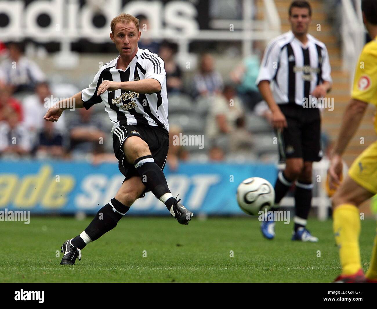 Newcastle United's Nicky Butt (L) in action against Villarreal during ...