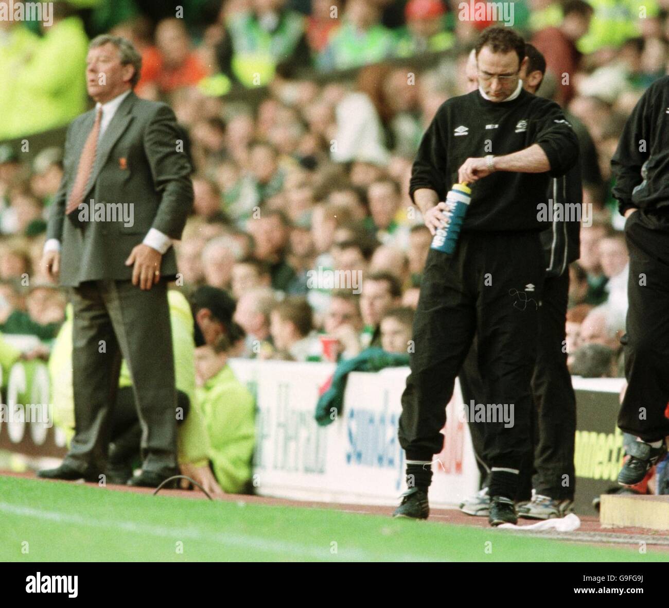 Full length clock watching football utd hi-res stock photography and ...