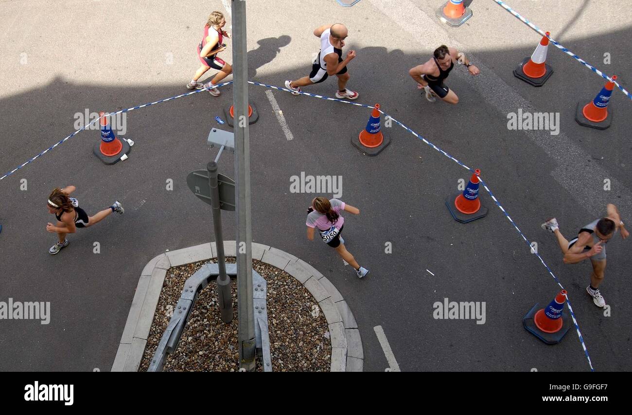 Male and female entrants run the streets of Docklands during The ...