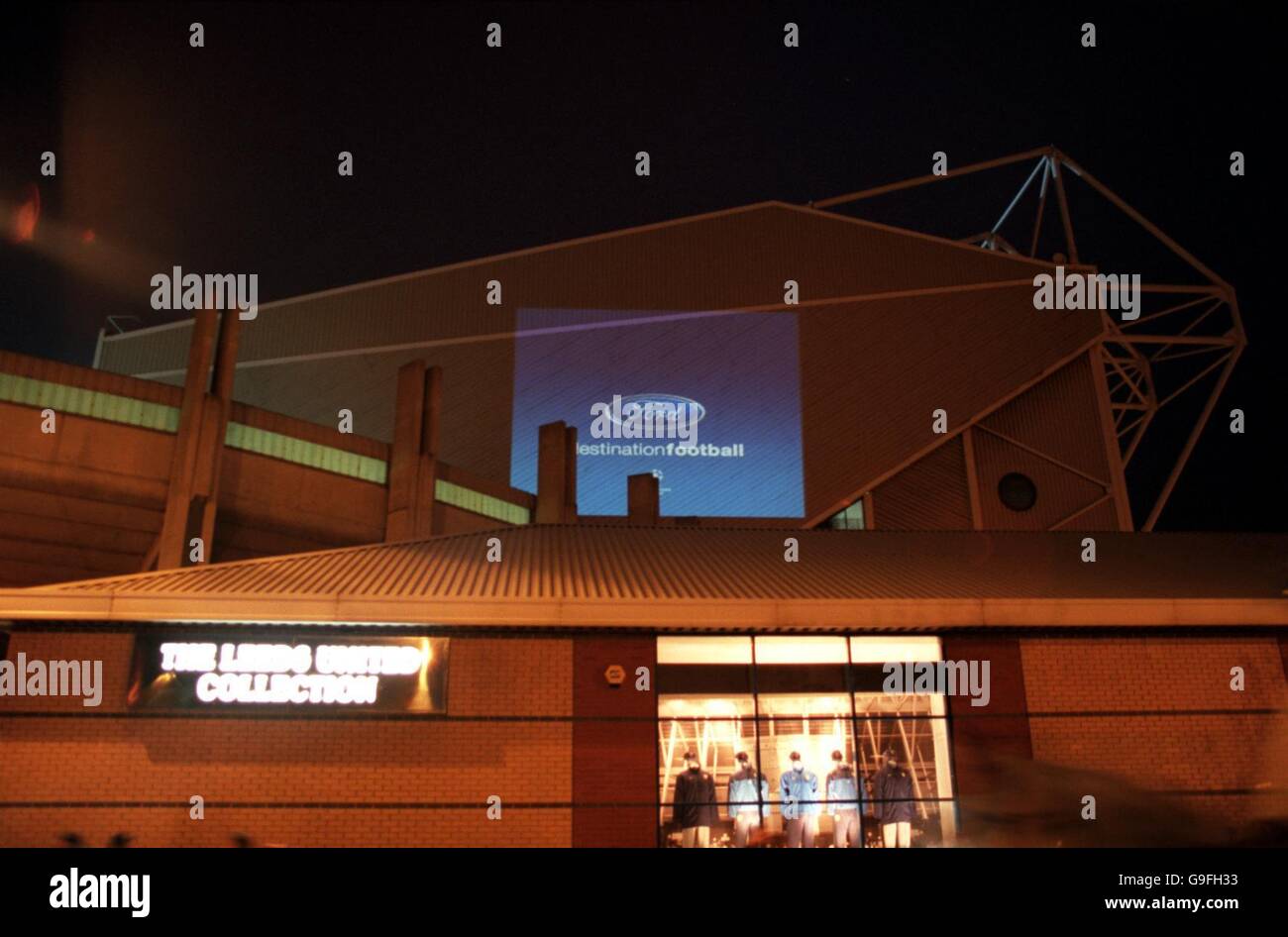 The Ford logo is projected onto the side of a stand at Elland Road ...