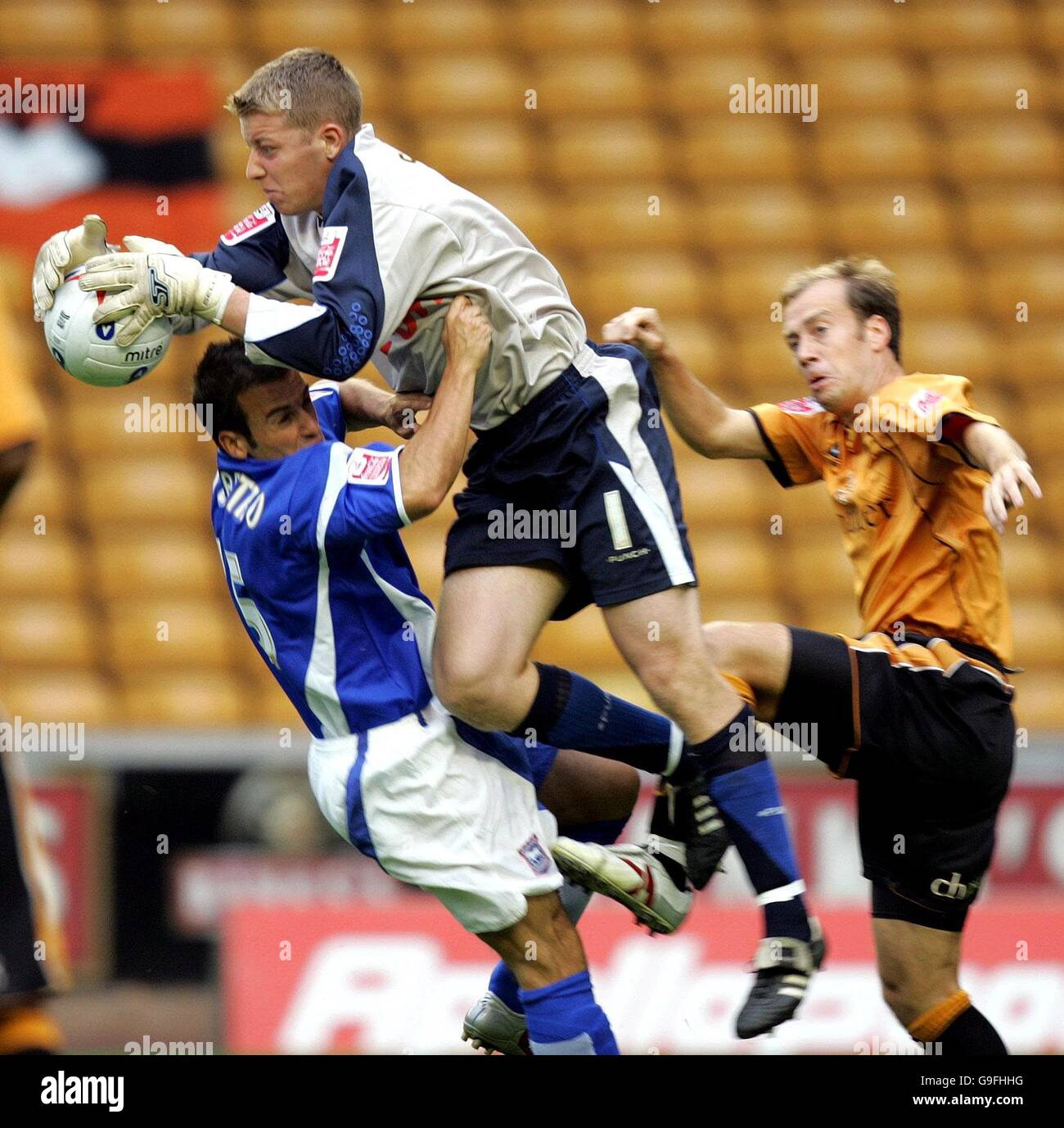 Ipswich goalkeeper Shane Supple collides with team-mate Lewis Castro ...