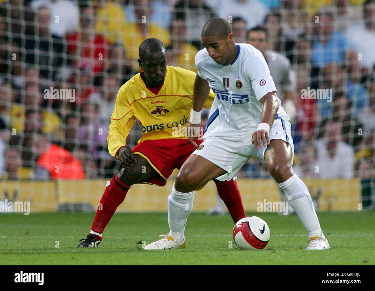 (L-R) Watford's Chris Powell and Inter Milan's Adriano battle for the ...