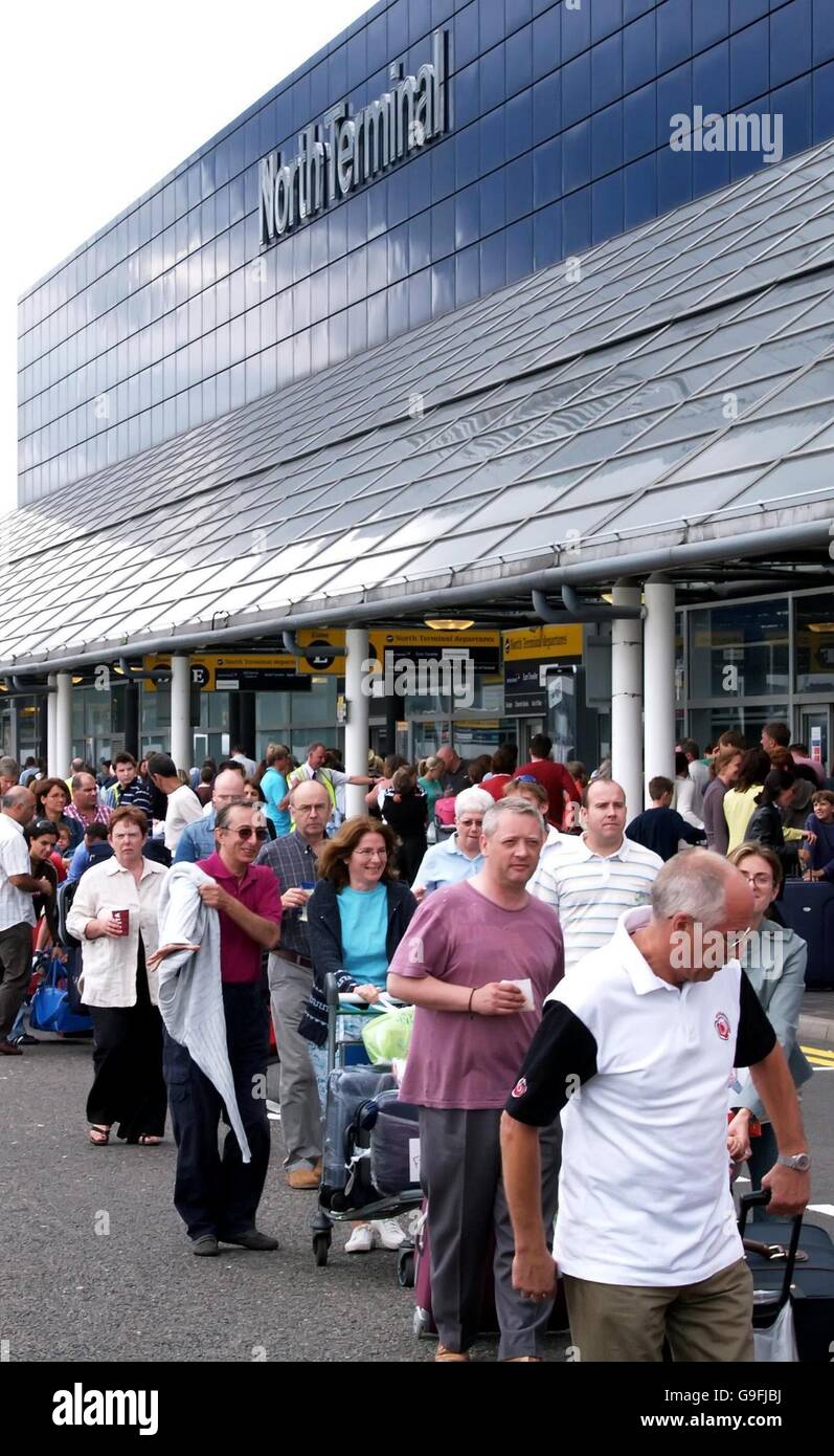 Passengers waiting outside the departure hall of the Gatwick North ...